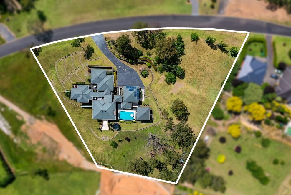 Hillside Luxury: Above-Ground Infinity Pool in Picton | Tropical Pools ...