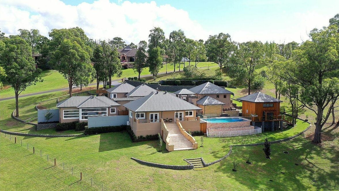 Hillside Luxury: Above-Ground Infinity Pool in Picton | Tropical Pools ...