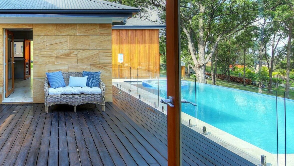 Hillside Luxury: Above-Ground Infinity Pool in Picton | Tropical Pools ...
